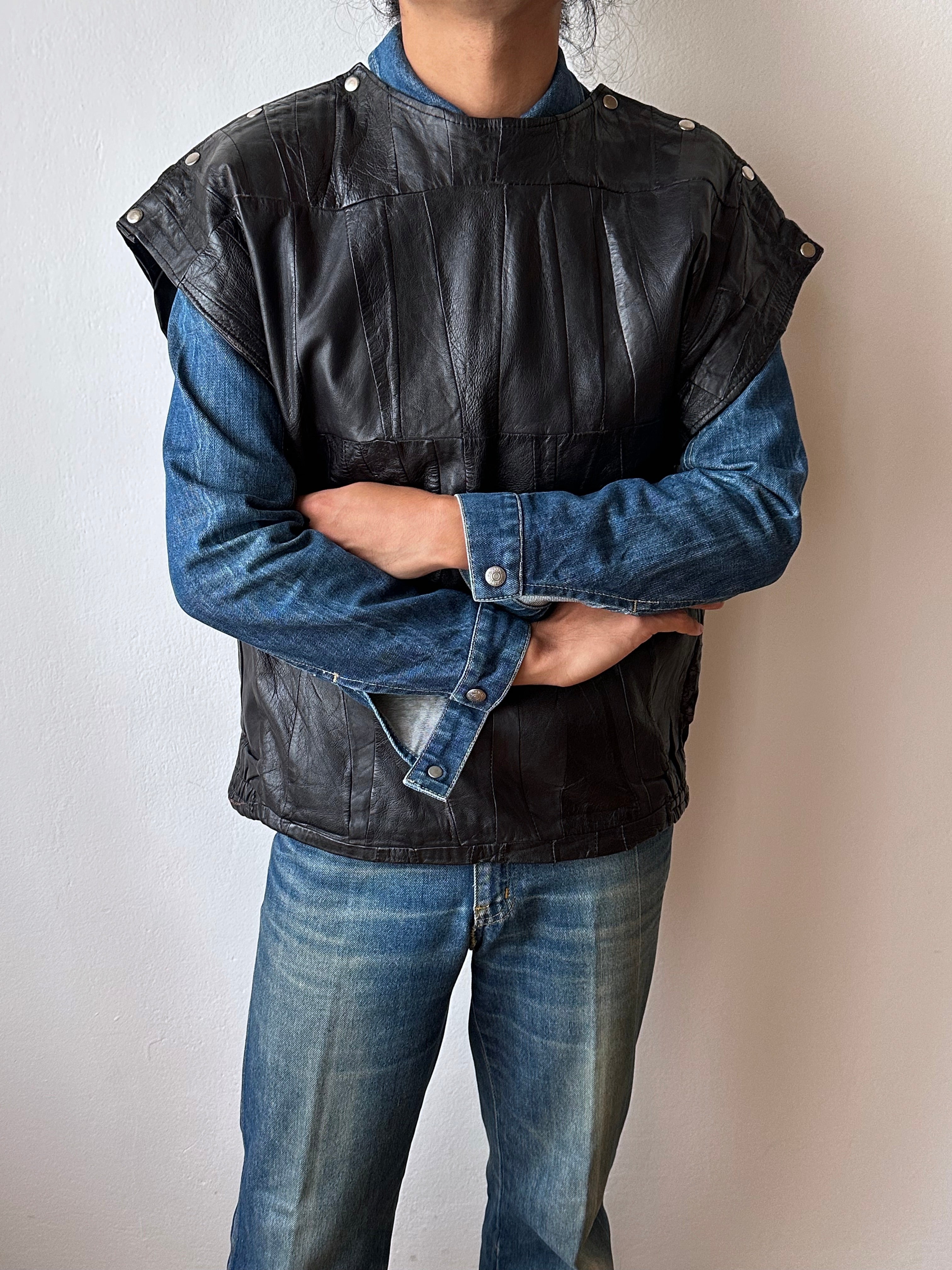 Black leather vest – TOTO